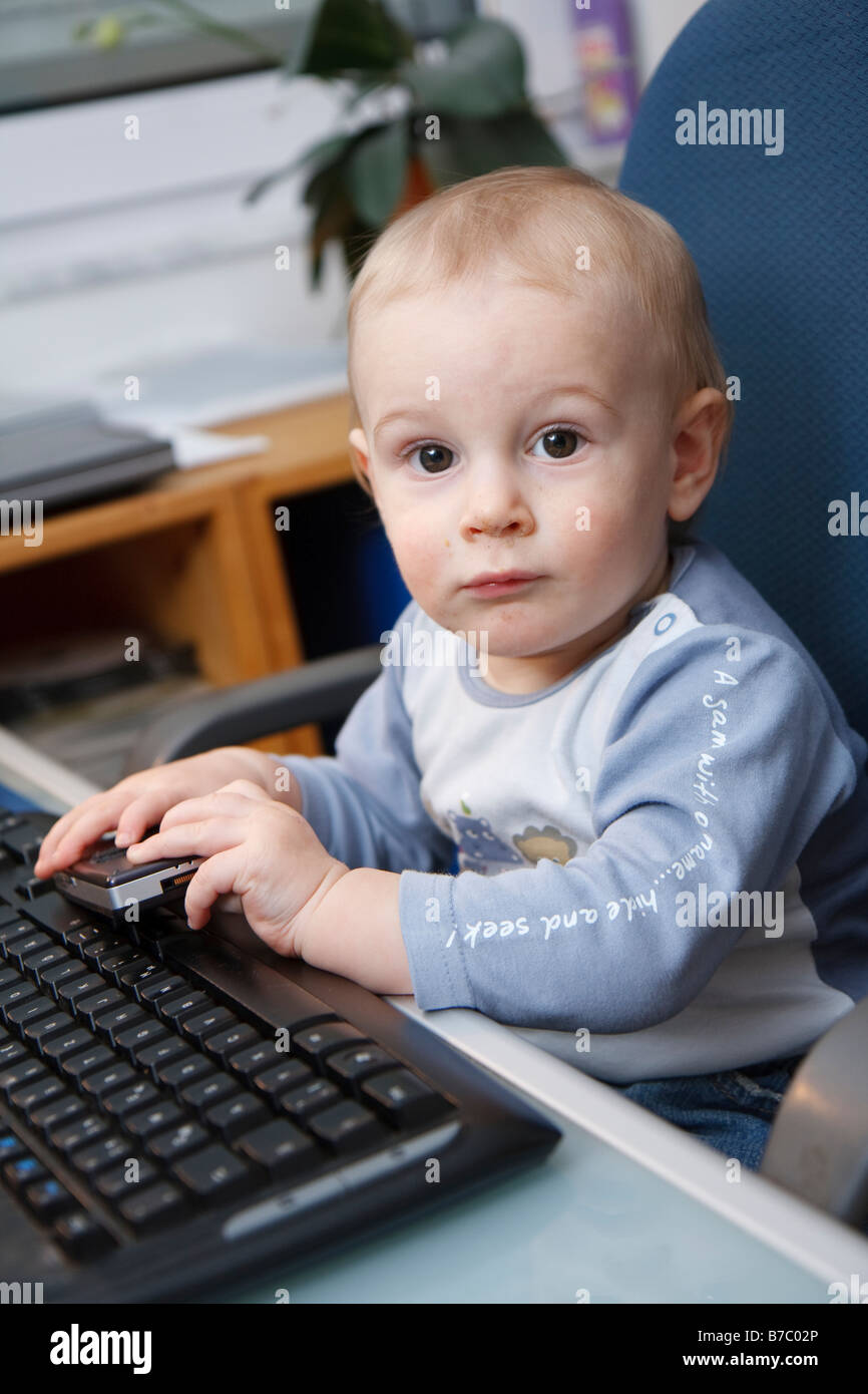 Infants computer hi-res stock photography and images - Alamy