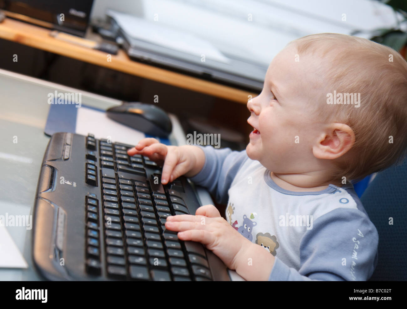 Infants computer hi-res stock photography and images - Alamy