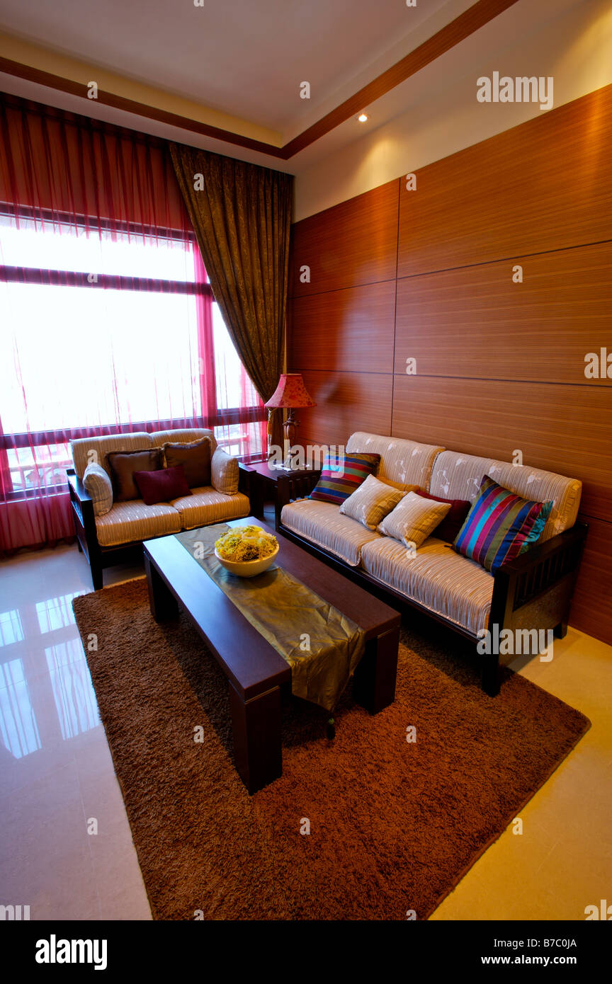 Modern living room with light coming in through the window Stock Photo ...
