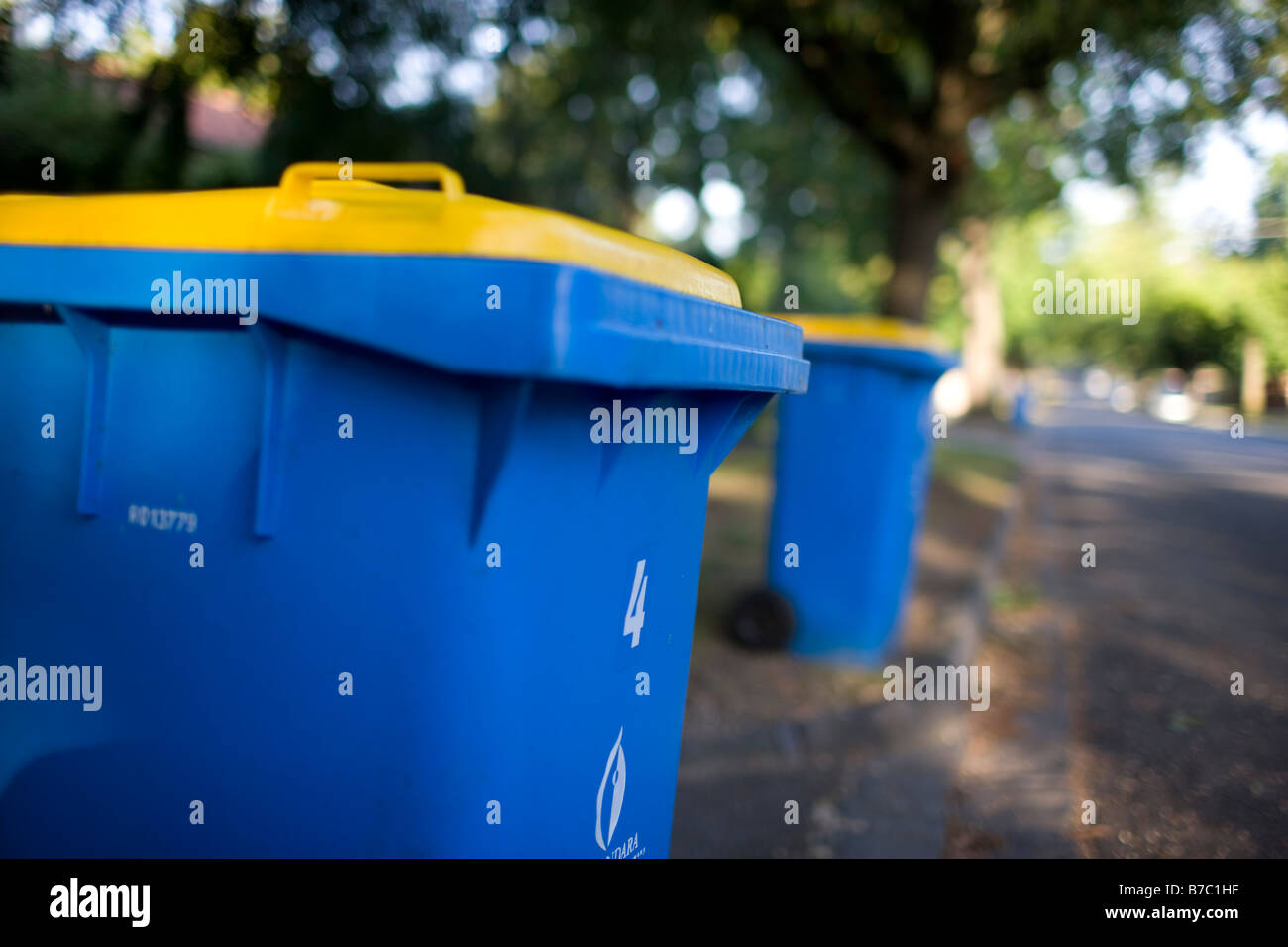 a recycling bin by the side of the road Stock Photo - Alamy