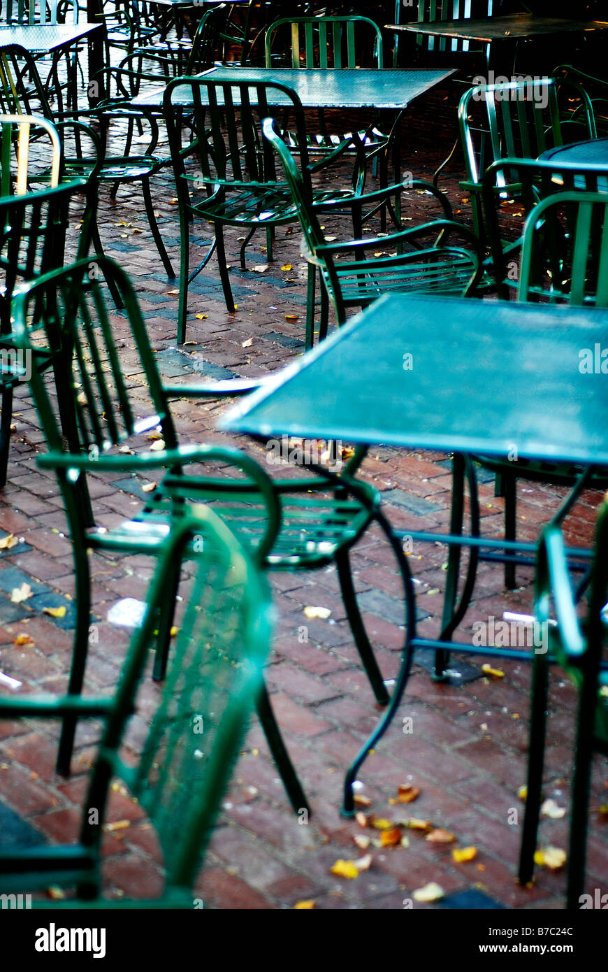 Empty tables and chairs outside Stock Photo - Alamy