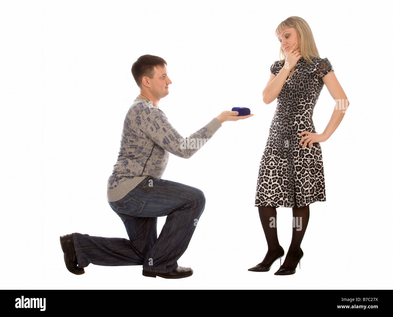 Young man give present sad girl isolated on white Stock Photo - Alamy