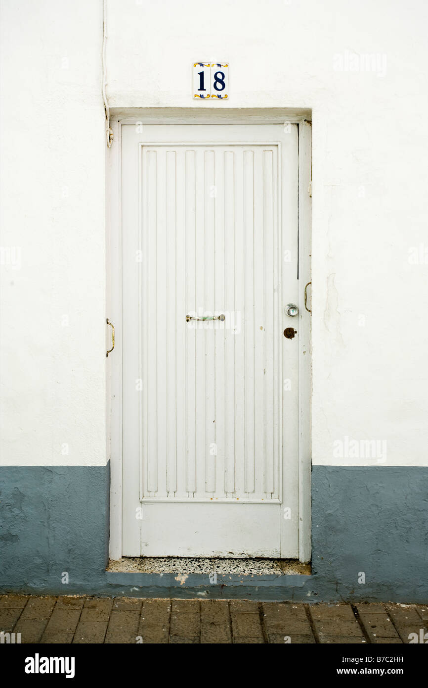 white wooden house entrance door with number 18, El Hierro, Canary ...