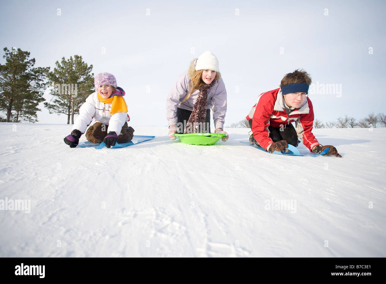 Group of kids sliding hi-res stock photography and images - Alamy