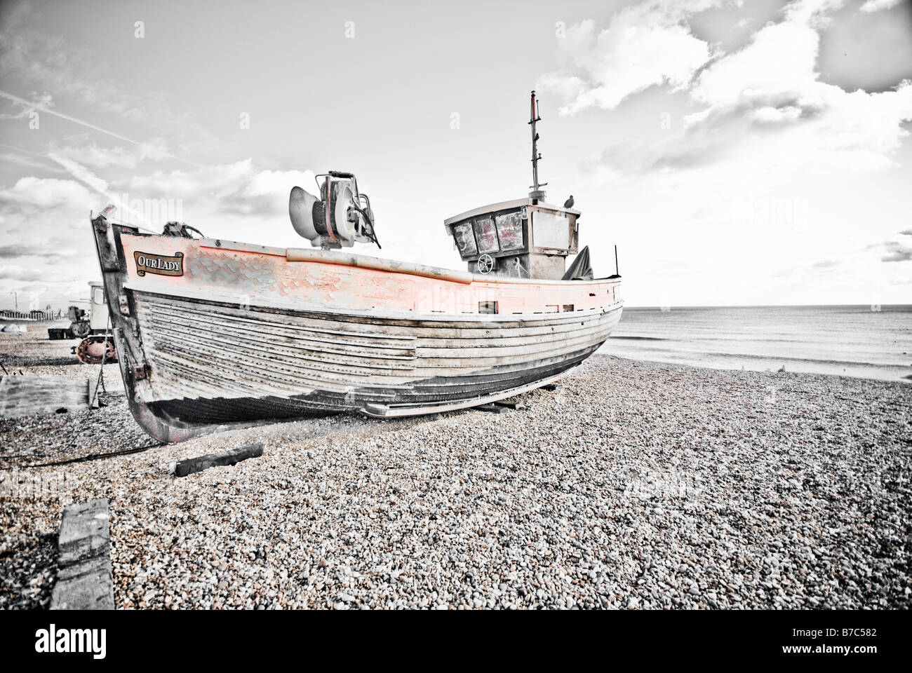 beached fishing boat Stock Photo - Alamy