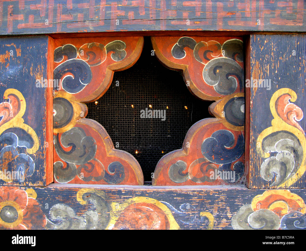 Traditionally painted temple window, Bhutan Stock Photo - Alamy