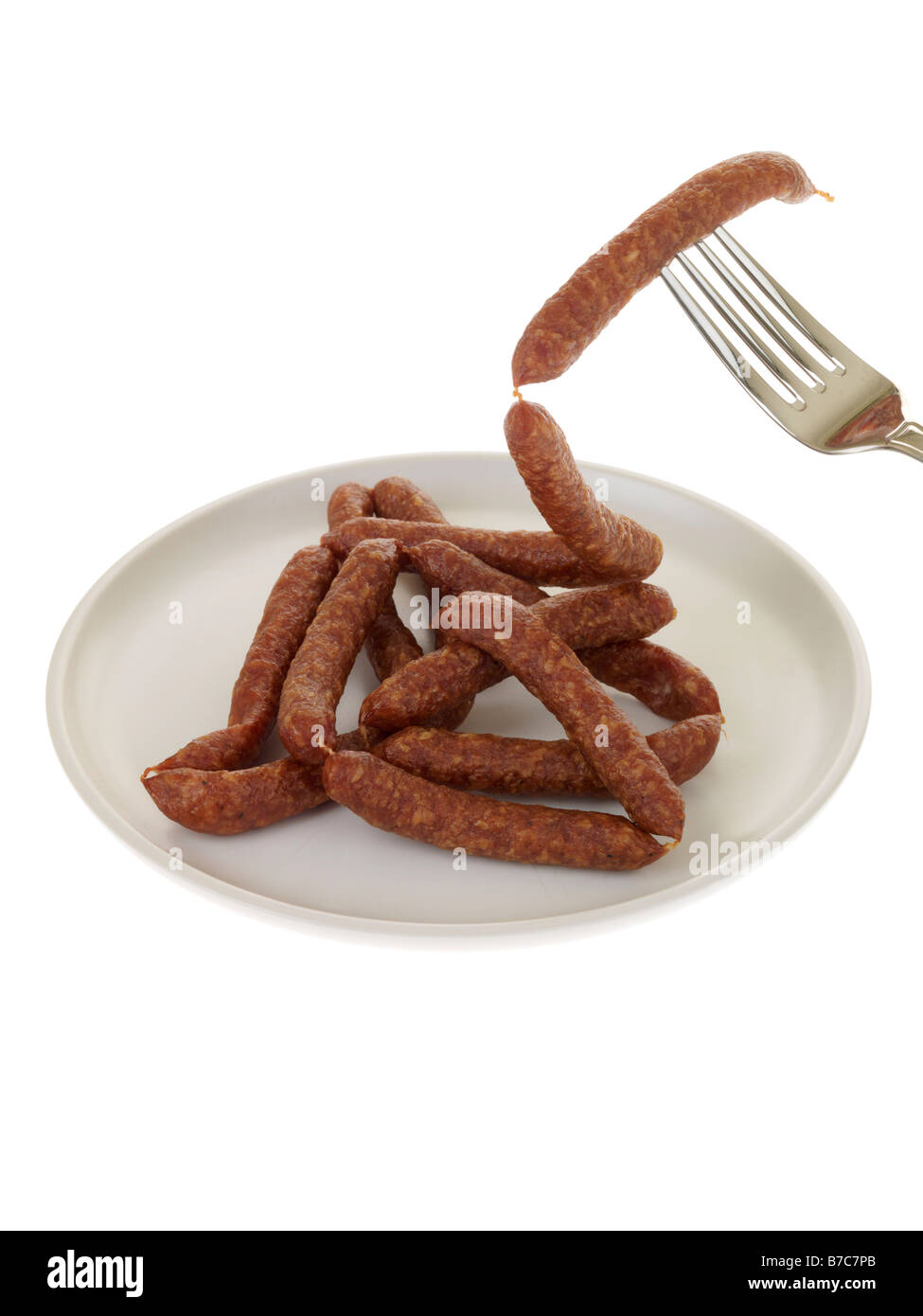 Fresh Tasty Spiced Pfiffikus Austrian Sausages On A Fork Isolated ...