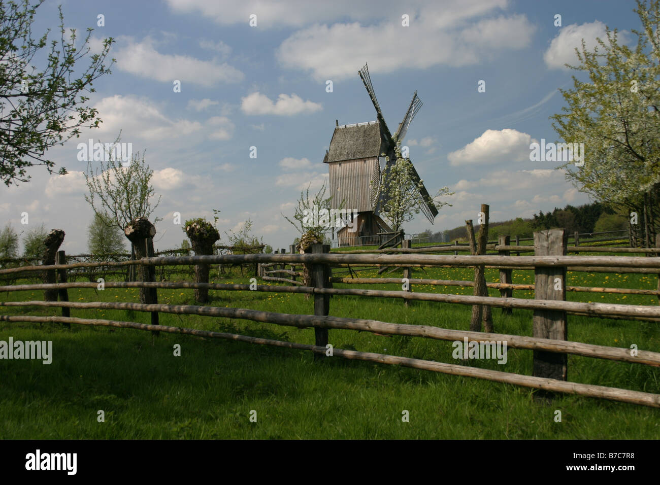 Landscape with a windmill Stock Photo - Alamy
