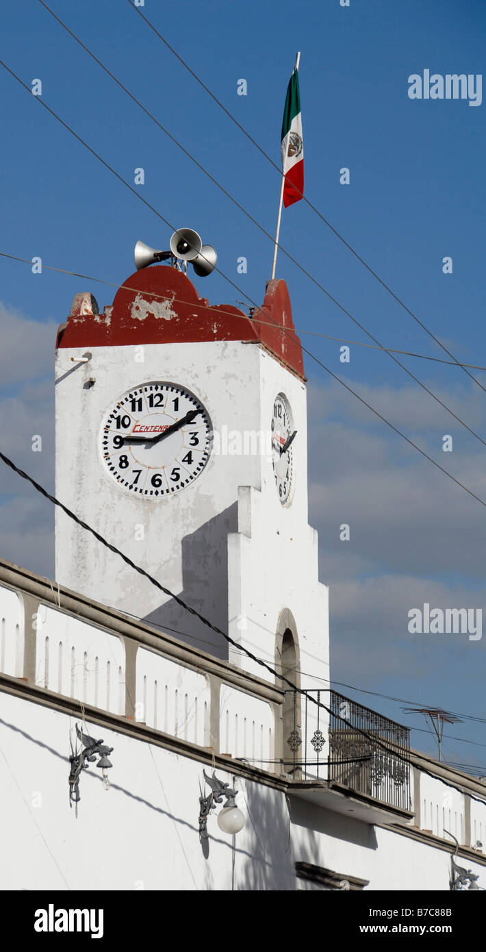 Clock on the wall with mexican flag in Tecali, Mexico Stock Photo - Alamy