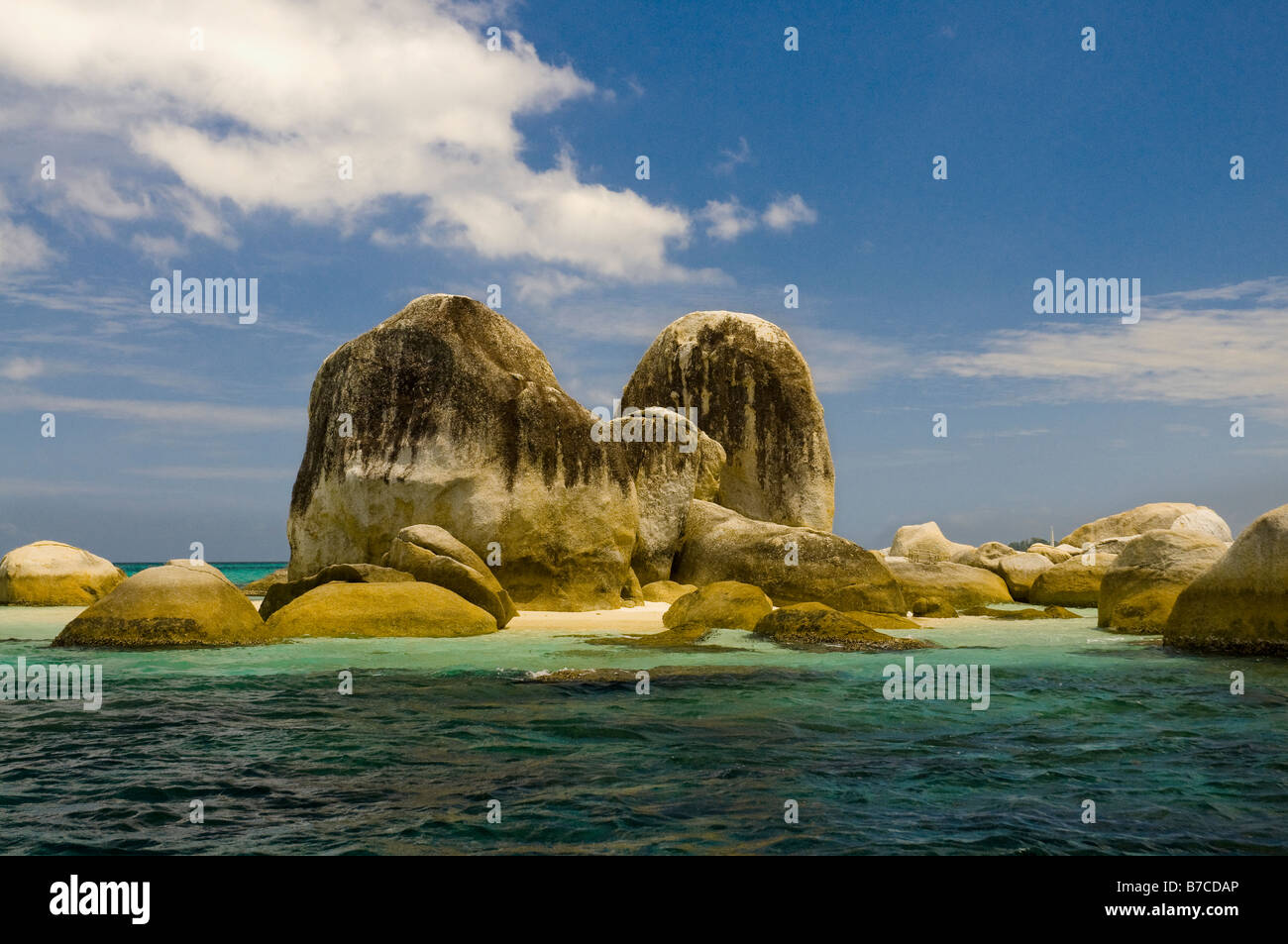 Big granite boulder formation in the middle of the sea Stock Photo - Alamy