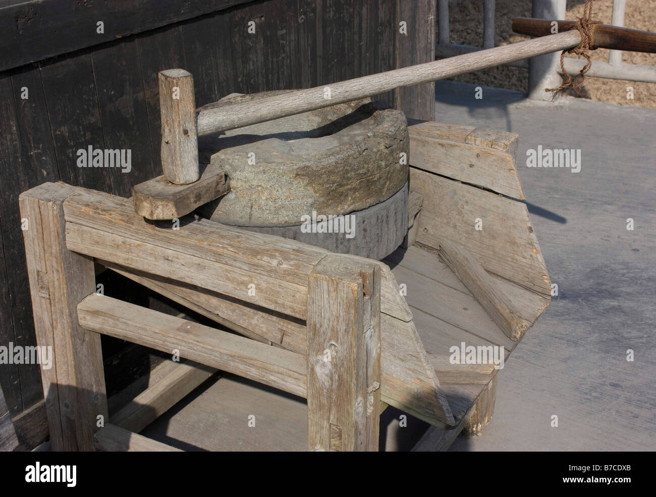 Traditional ancient chinese rice grinder make of solid granite on ...