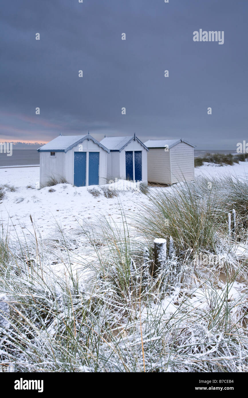 Snowy beach huts Stock Photo - Alamy