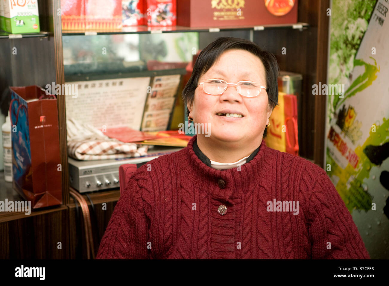 mama owner in china restaurant Stock Photo - Alamy