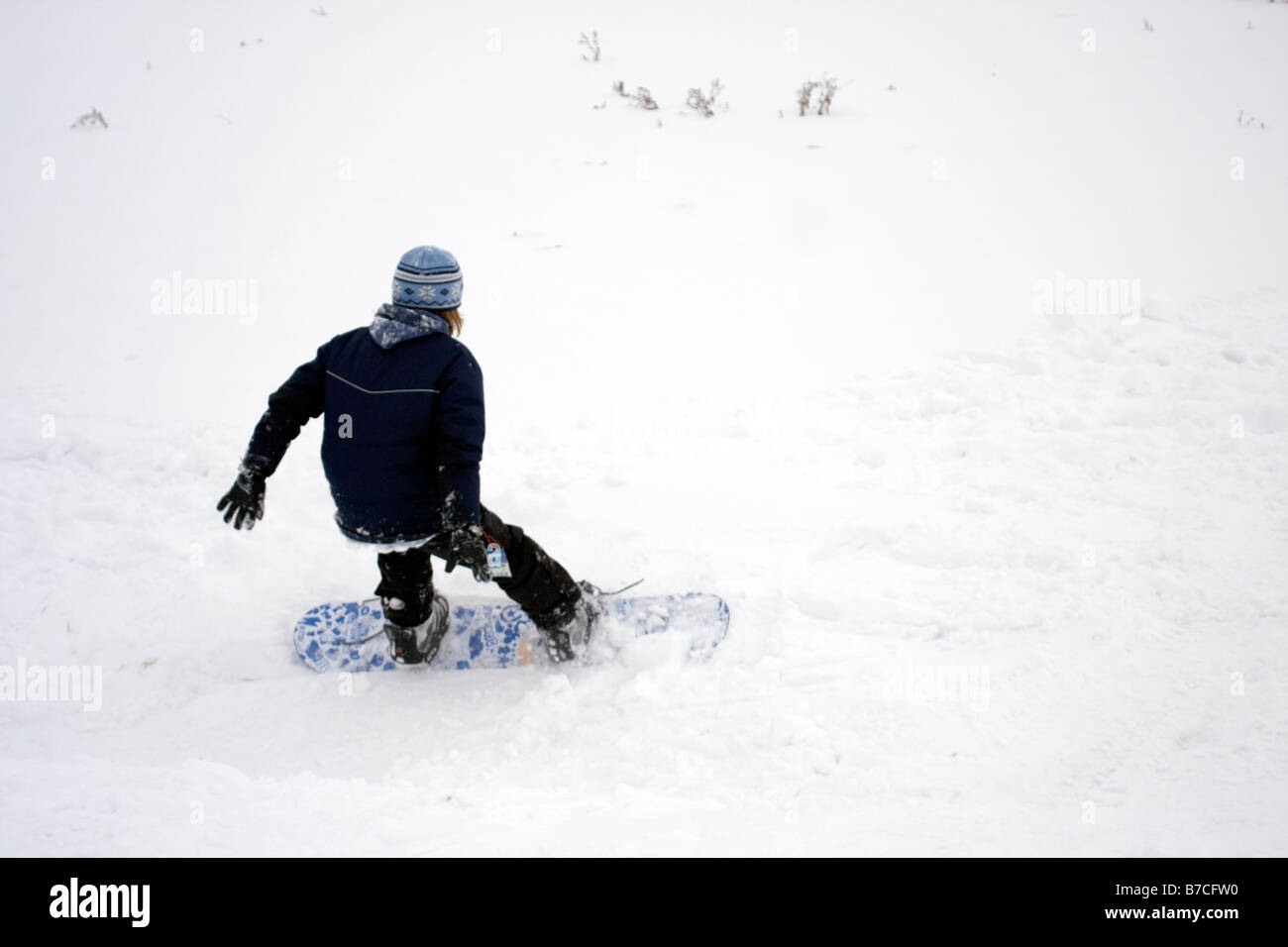 Teenage snowboarder having fun on the snow Stock Photo - Alamy