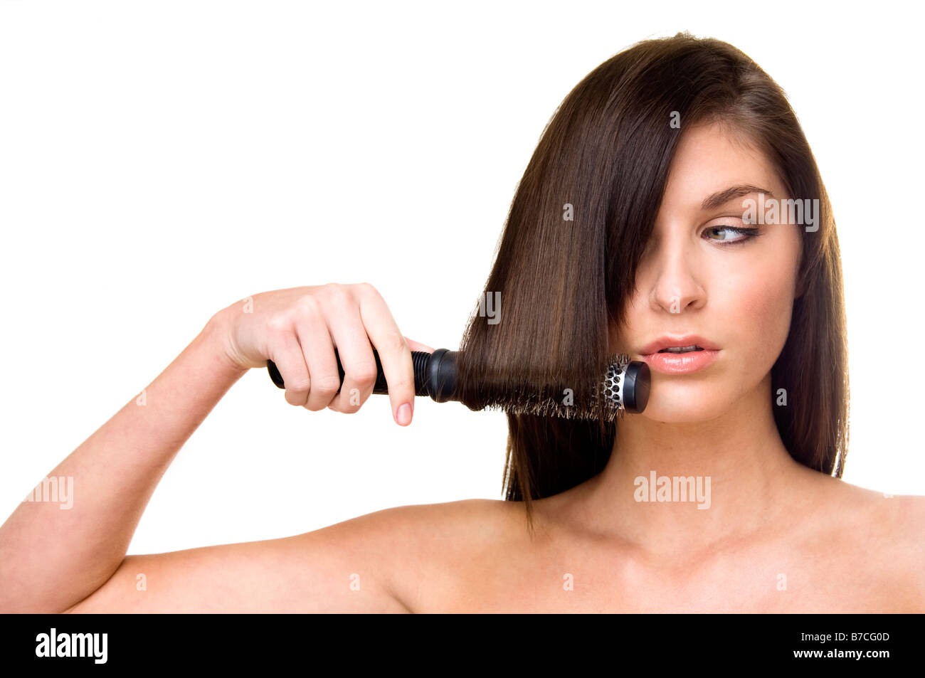 woman brushing her hair Stock Photo - Alamy