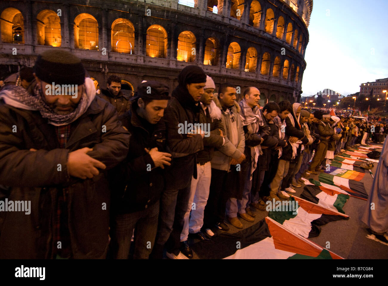 Palestinians pray during the demonstration against Israel massacre of ...