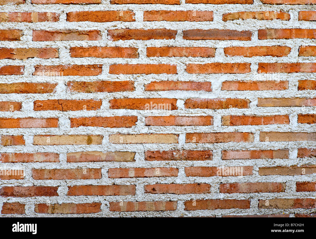 slim red bricks wall background Stock Photo - Alamy
