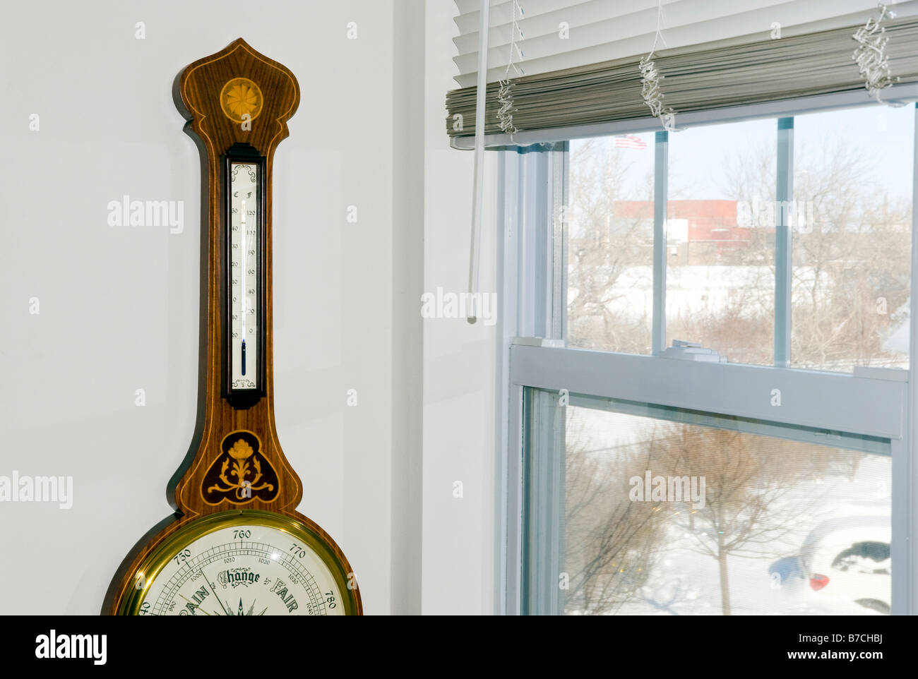 Fancy Thermometer next to winter window Stock Photo - Alamy