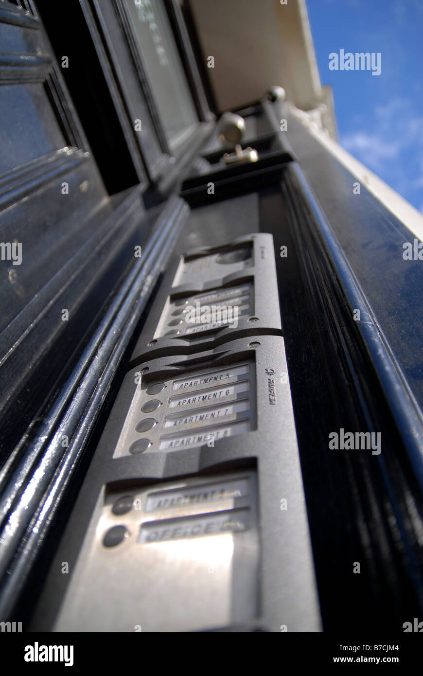 A row of door bells at at the entrance to some converted flats ...
