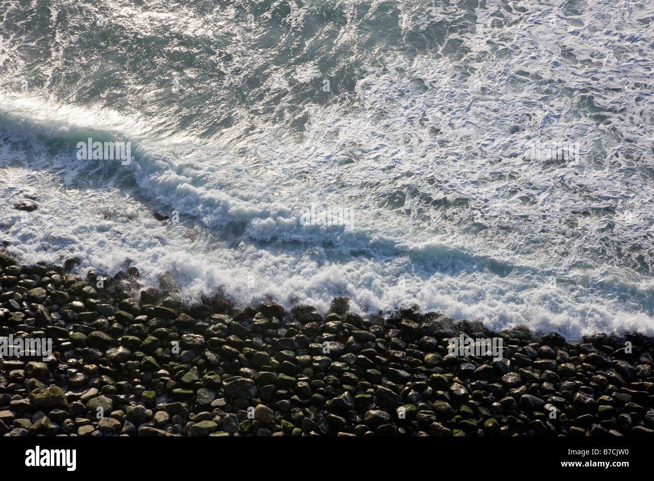 Wave crashing on beach hi-res stock photography and images - Alamy