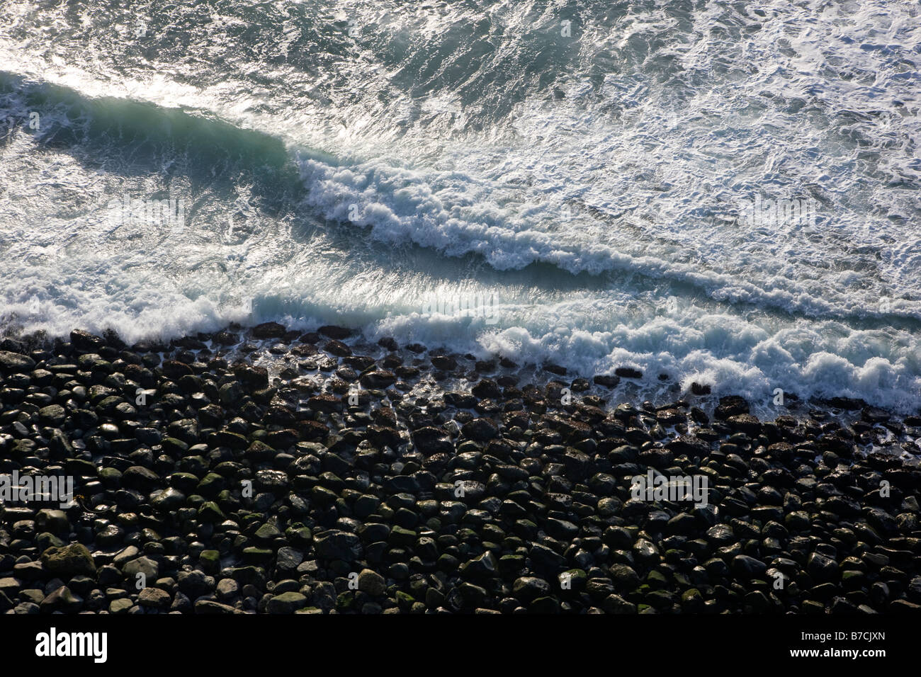 Wave crashing on beach hi-res stock photography and images - Alamy