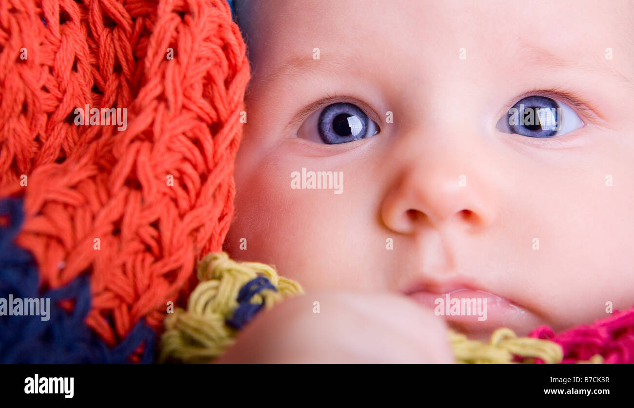 Portrait of three month old baby girl with big blue eyes Stock Photo ...