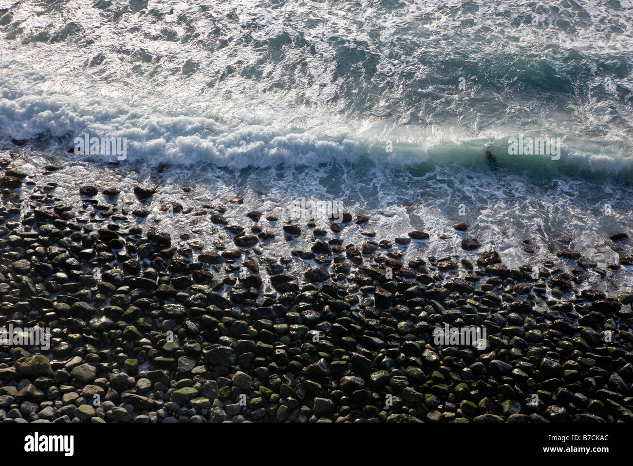 Wave crashing on beach hi-res stock photography and images - Alamy