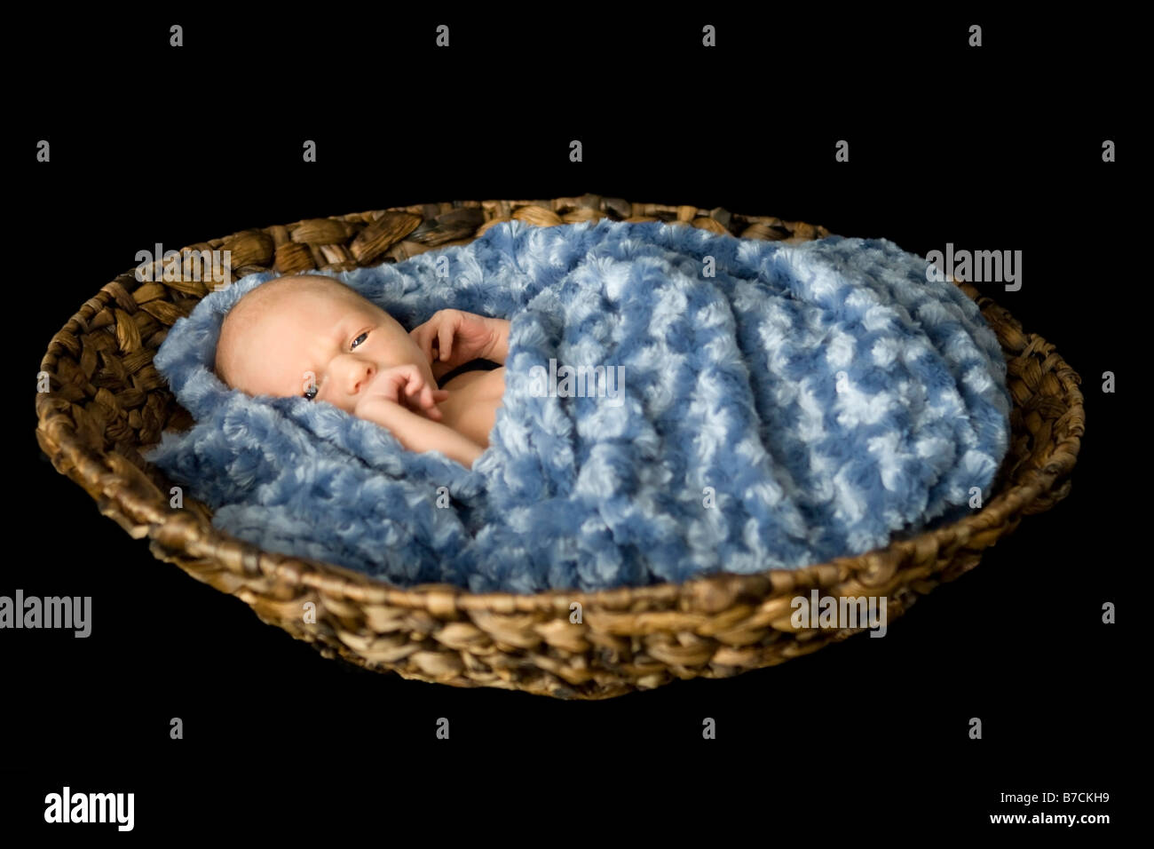 Infant in basket hi-res stock photography and images - Alamy