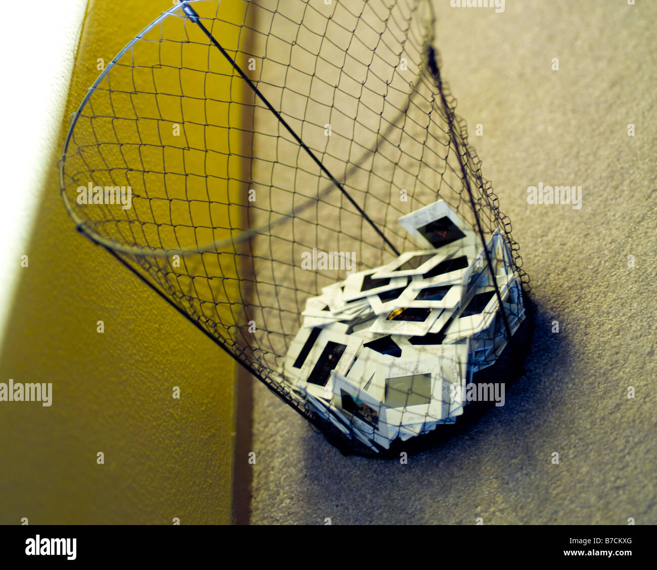A waste basket full of slides, film being dead technology Stock Photo ...