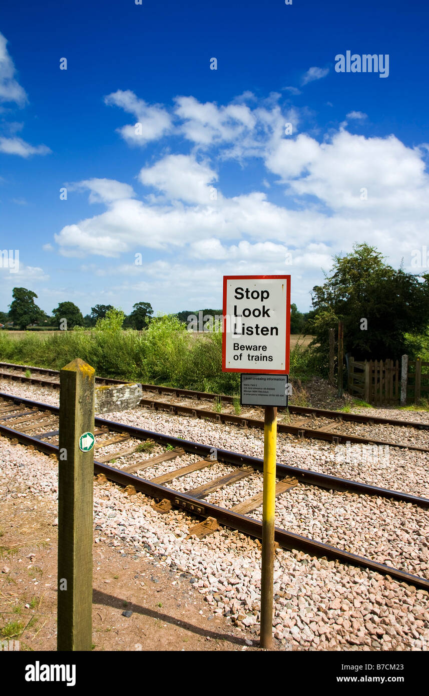 Stop Look and Listen sign at railway pedestrian crossing in rural ...