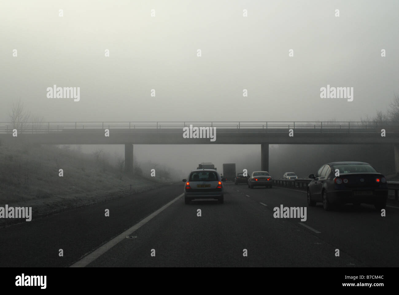 Motorway traffic during poor weather conditions - fog Stock Photo - Alamy