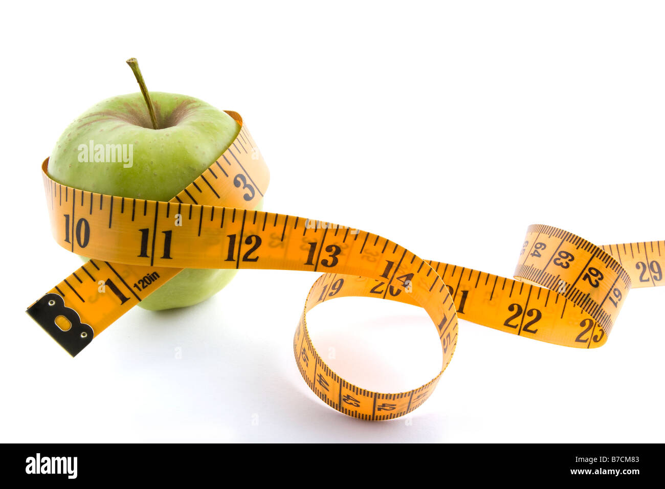 Green Apple with Tape Measure Stock Photo - Alamy