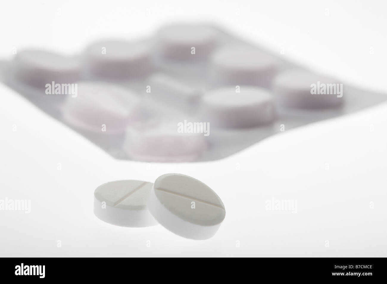 two paracetamol tablets with blister pack isolated on white background ...