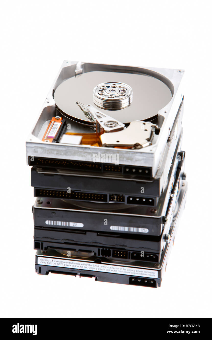 pile of open computer hard drives on a white background Stock Photo - Alamy