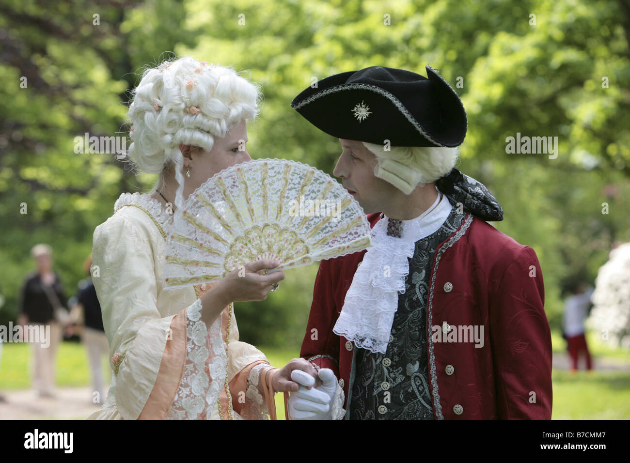 couple in the baroque period, whispering covered behind a fan, Germany ...