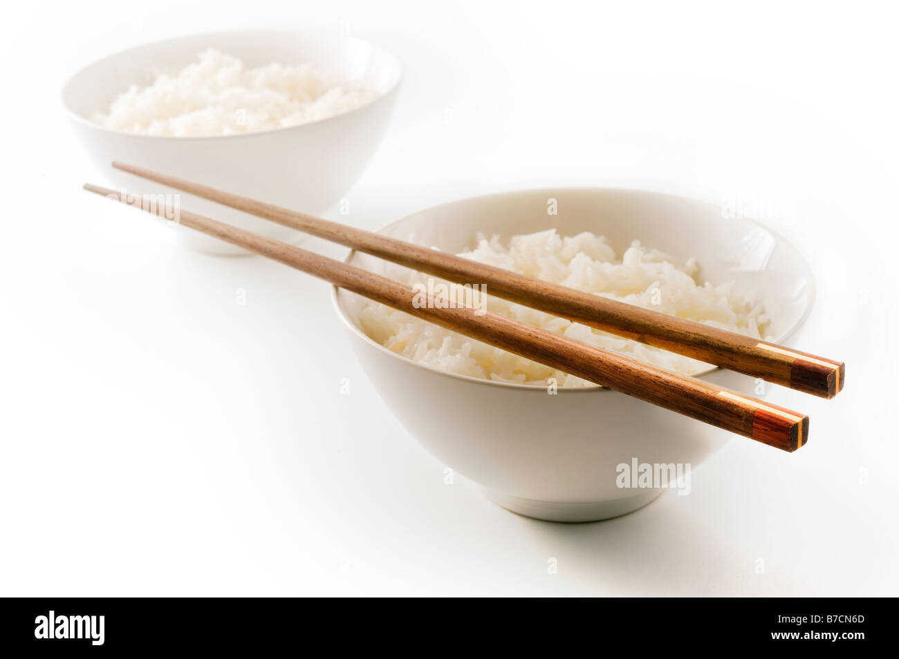 two bowls of plain rice isolated on on white Stock Photo - Alamy