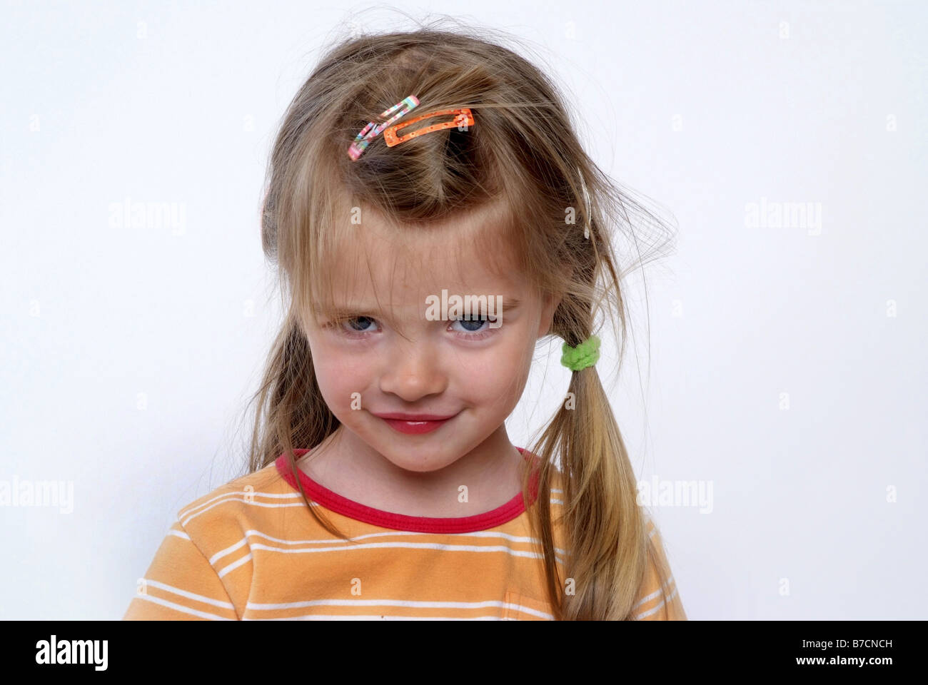 roguish small blond girl Stock Photo - Alamy