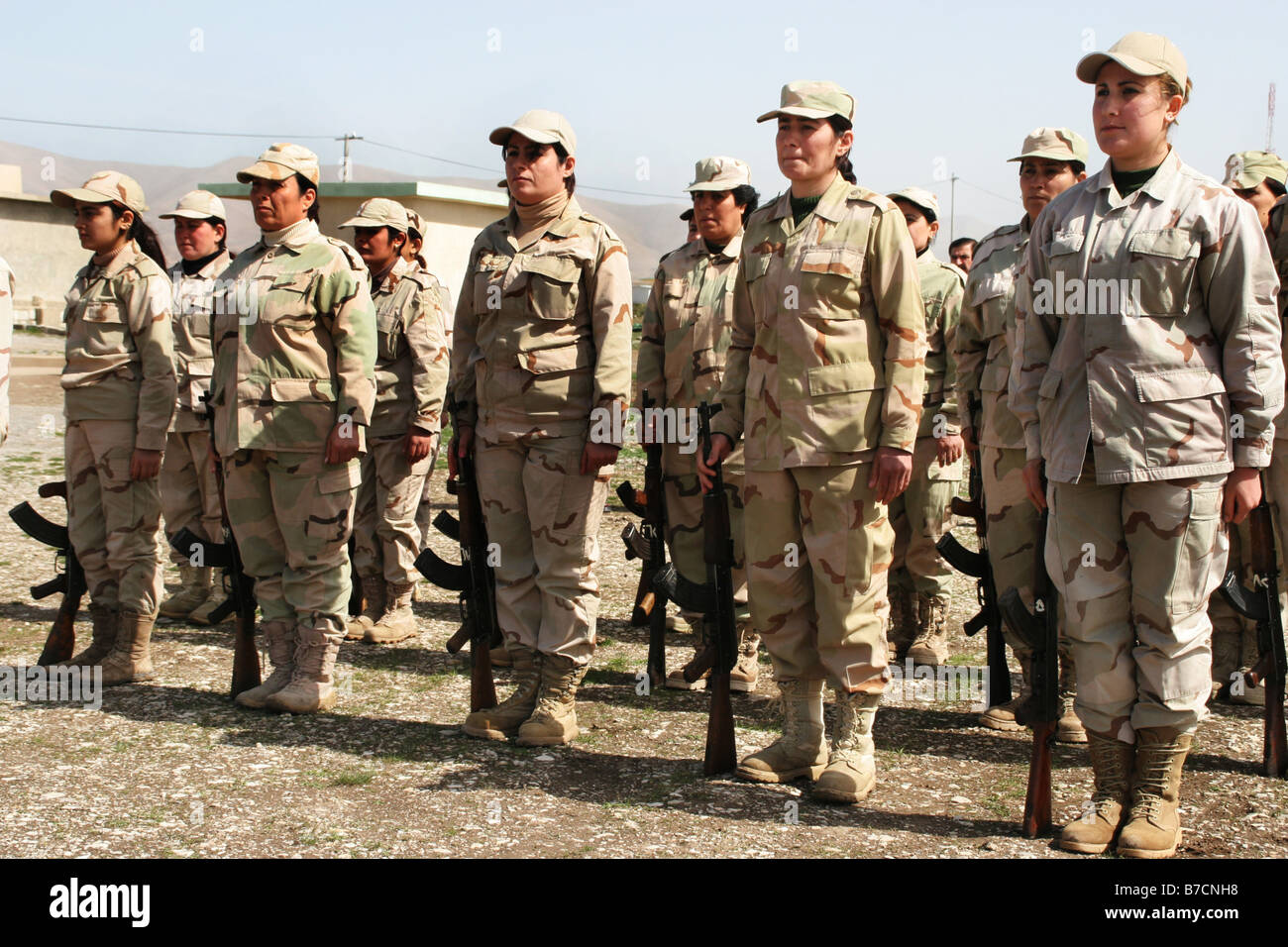 Peshmerga women fighters in camouflage during military exercise, Iraq ...
