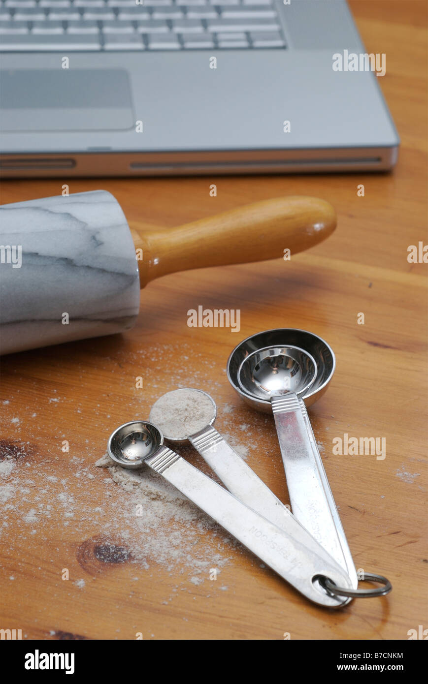 Baking in the internet age computer as a kitchen aid Stock Photo - Alamy