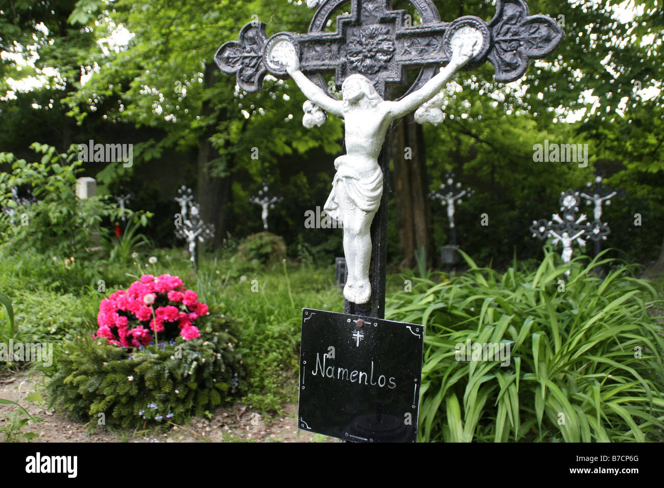 Grave with a cross in the cemetery of the nameless in Vienna, Austria ...