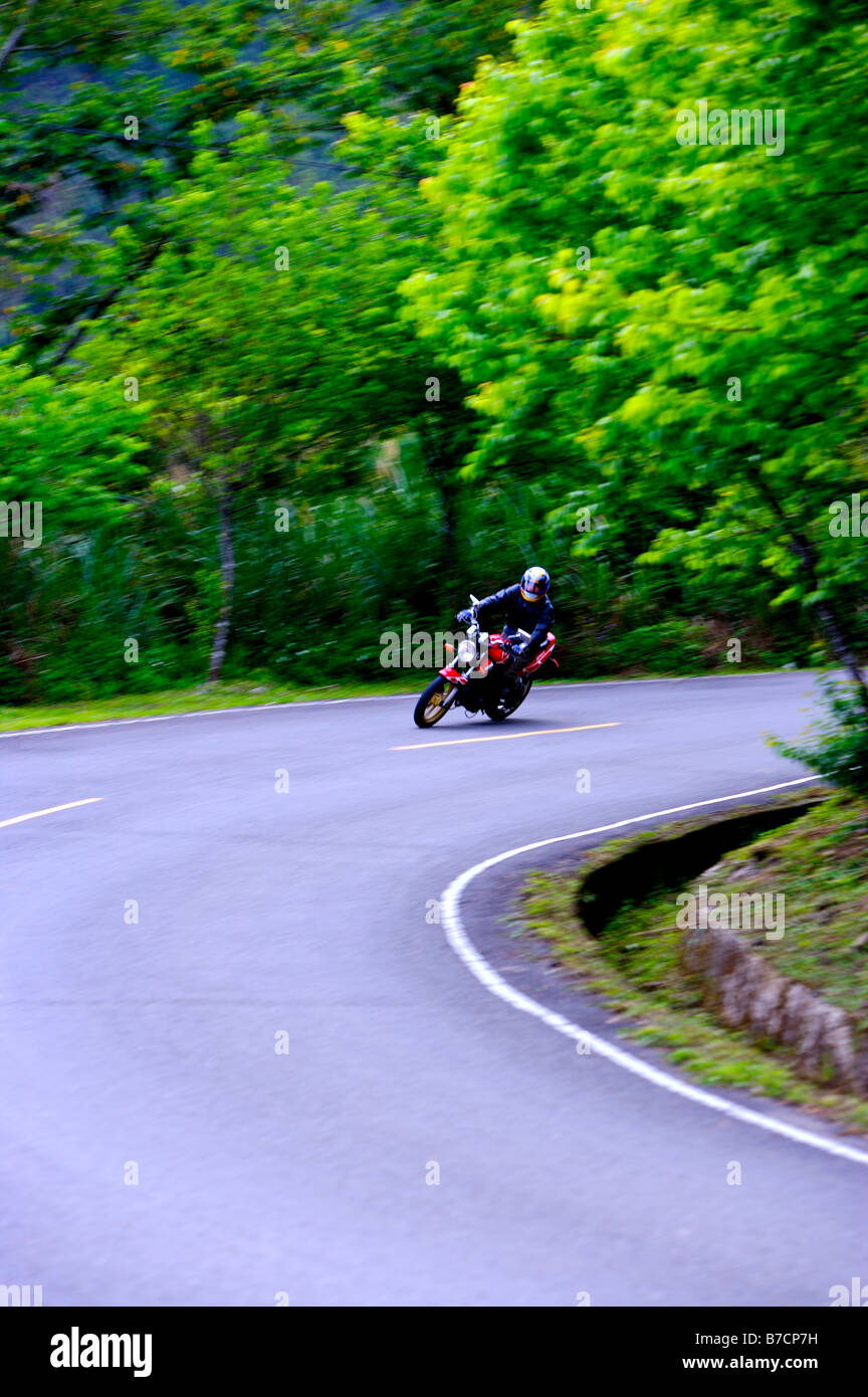 One people riding motorcycle in Taoyuan Taiwan Stock Photo - Alamy