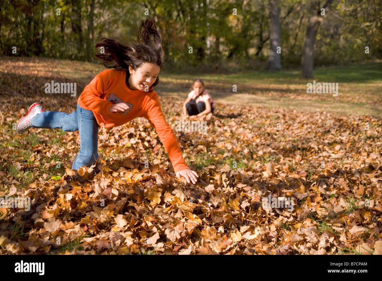 Children jump leaves hi-res stock photography and images - Alamy