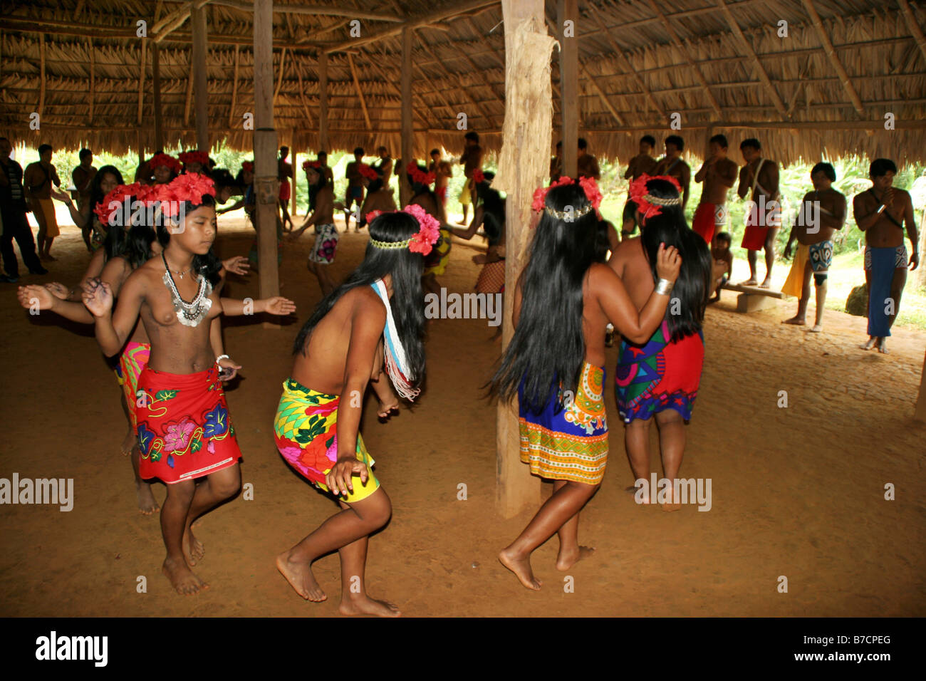 Embera Indians In Traditional Clothing Dancing In Village Parar Paru On