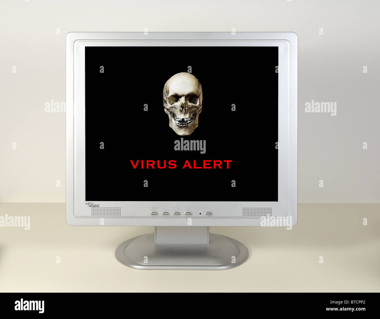 Monitor with virus alert Stock Photo - Alamy