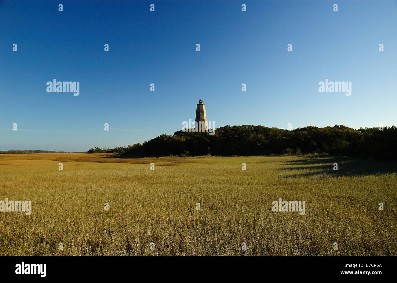 Old Baldy Lighthouse and interior marsh of Bald Head Island on clear ...