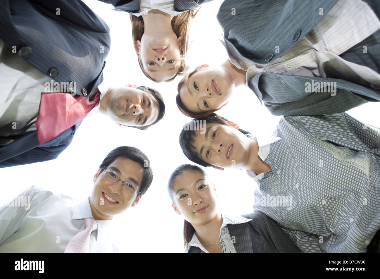 Six business people standing together and looking at the camera Stock ...