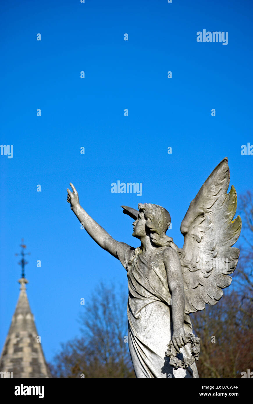 decorative angel pointing skywards at putney vale cemetery, wandsworth ...