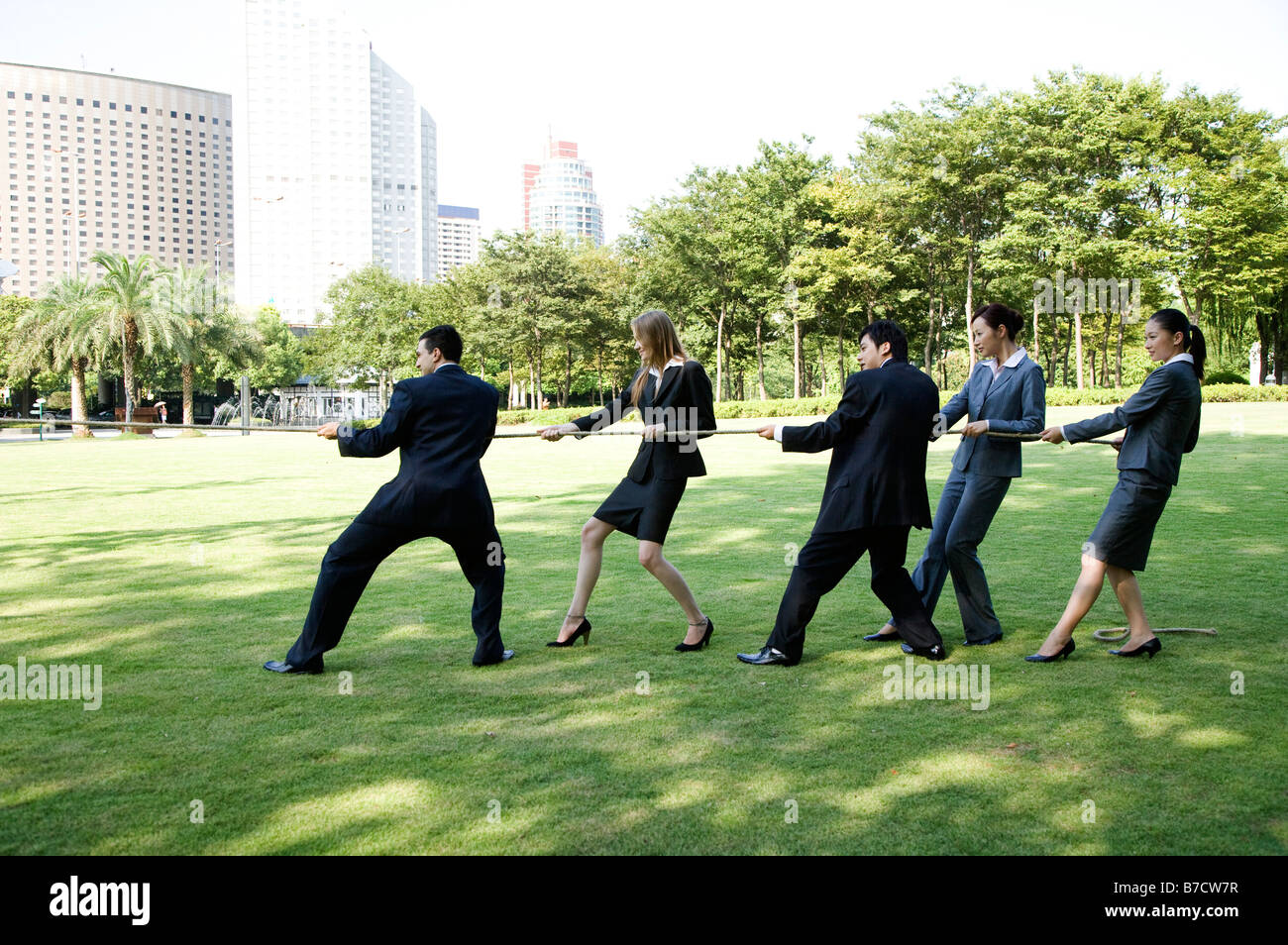 Person pulling rope hi-res stock photography and images - Alamy