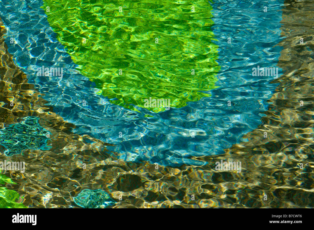 Patterns form through the water of a hotel pool in Athens Stock Photo ...