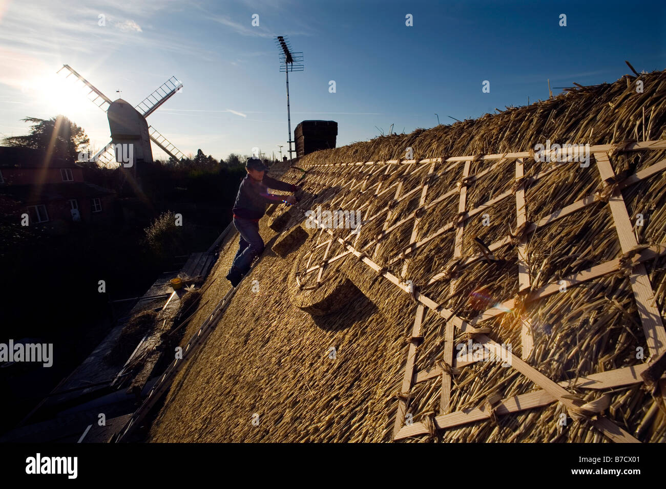 Thatcher reed long straw thatching roof Finchingfield traditional work ...